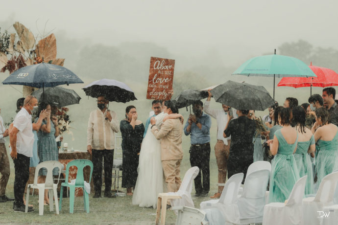 Outdoor Wedding Gets Spoiled By Rain, Guests Stay Despite Downpour