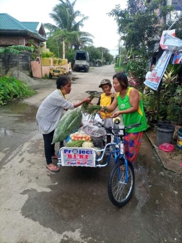 Cops From Cagayan Buy Bicycle And Sidecar For Aeta Vegetable Vendors